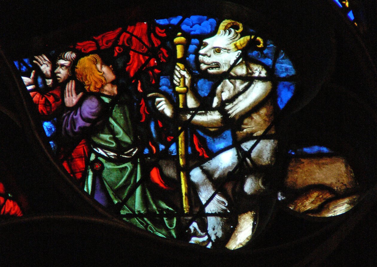 The west rose window depicting a scene from the Book of Revelation ...