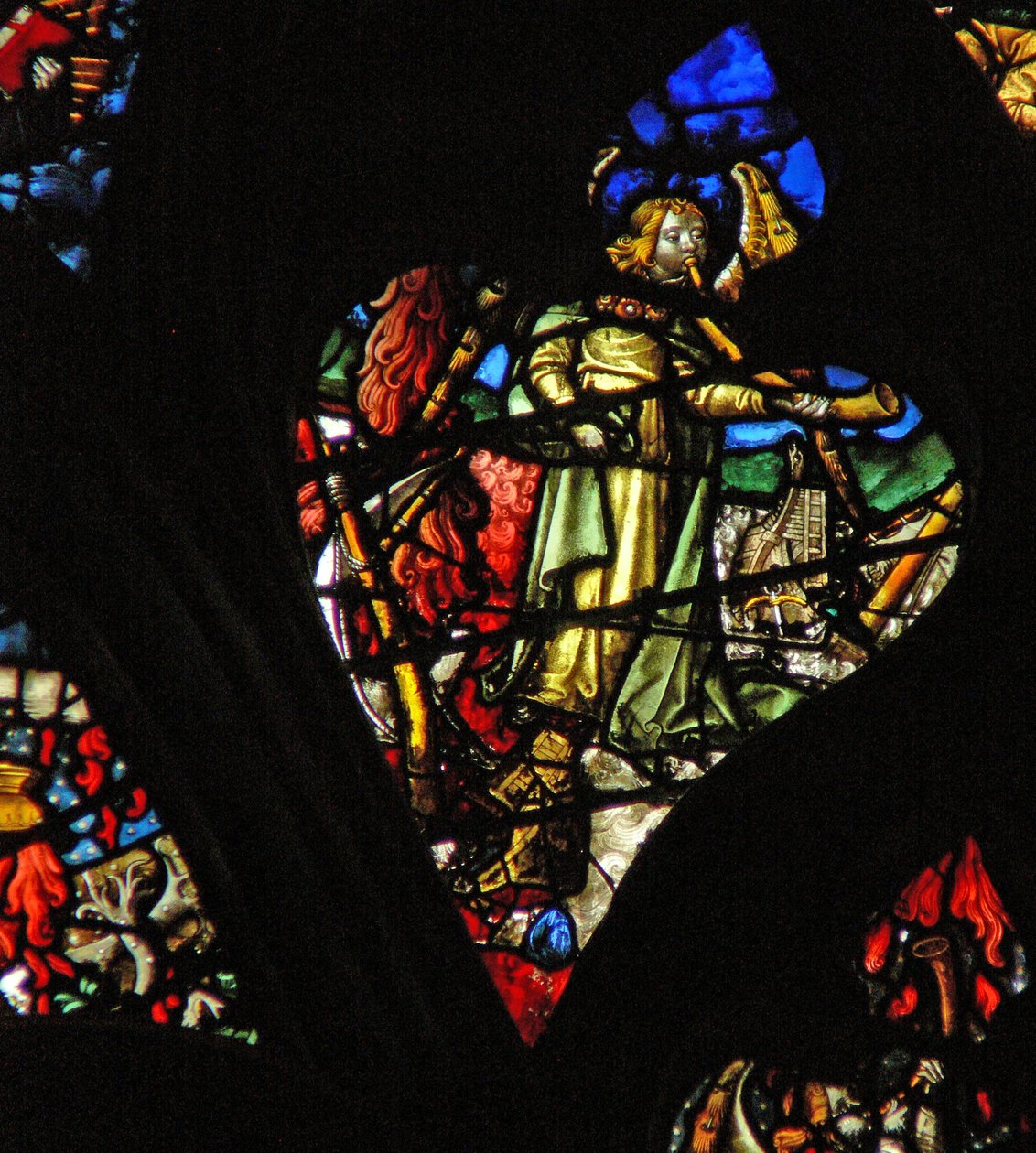 The west rose window depicting a scene from the Book of Revelation ...