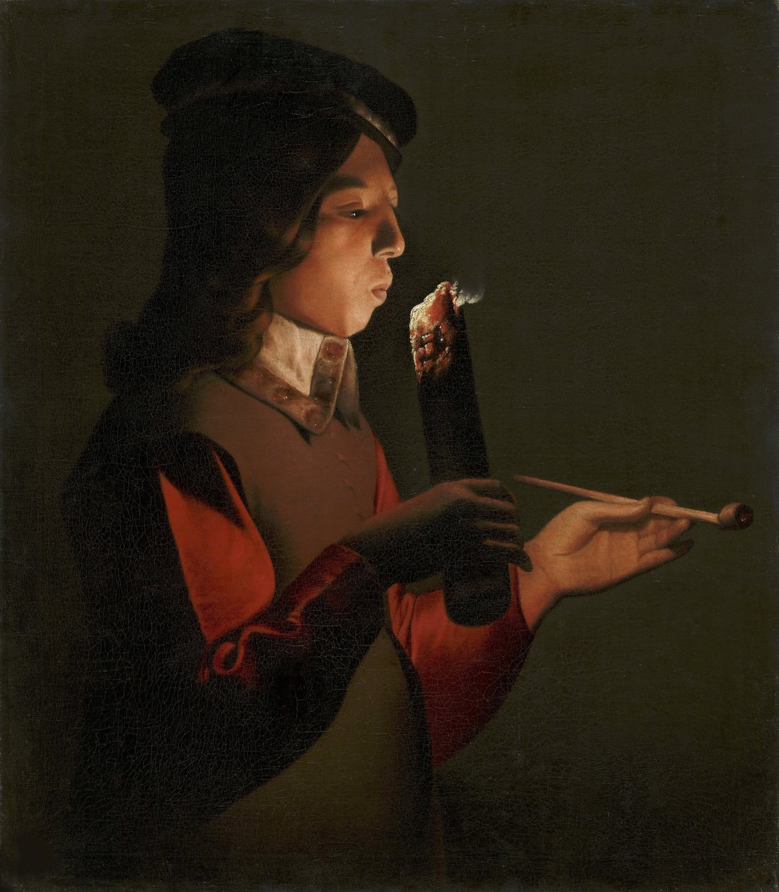 A Young Boy with a Pipe, Blowing on a Firebrand