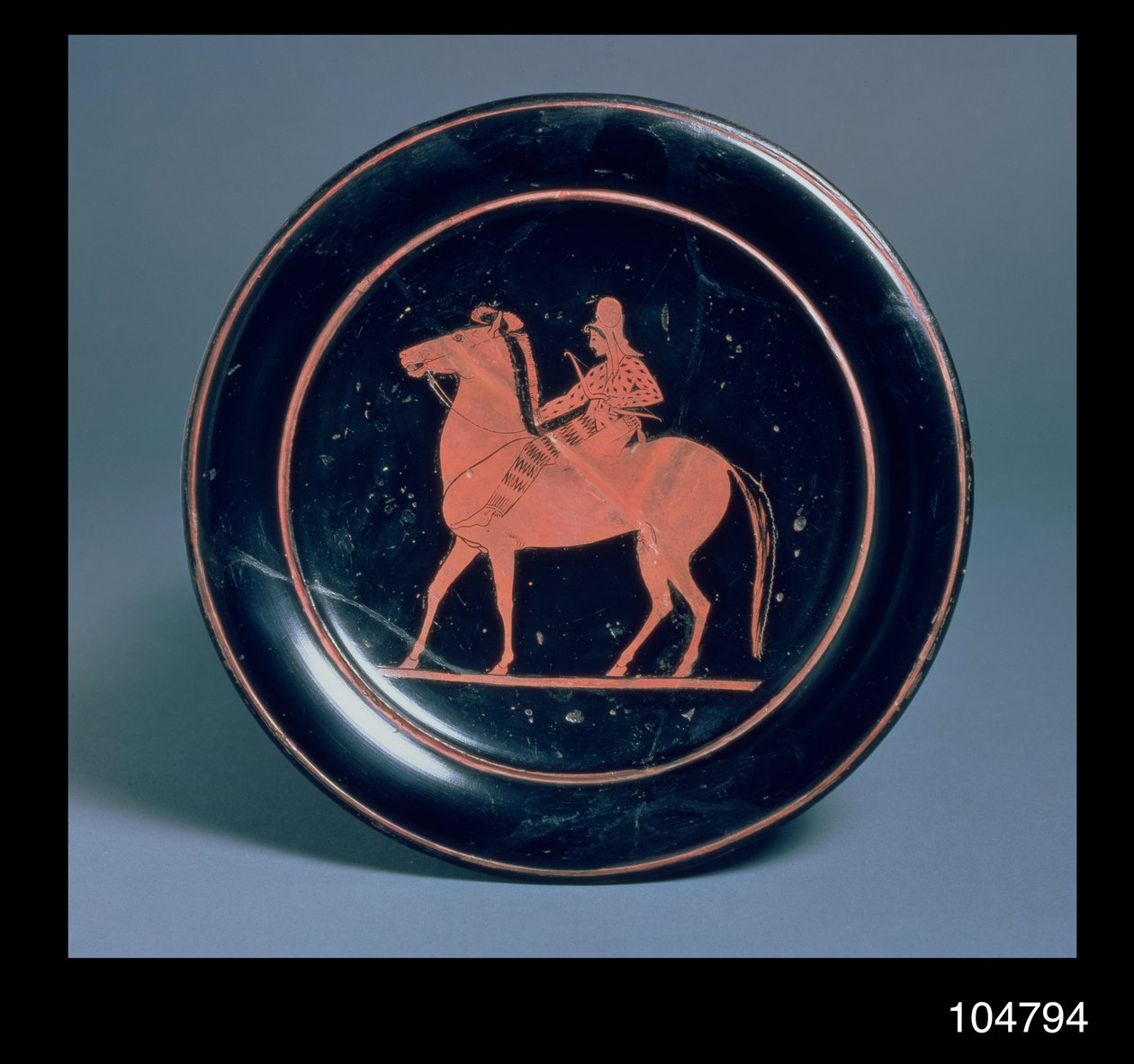 Attic Red-Figure Plate Decorated with an Archer on Horseback