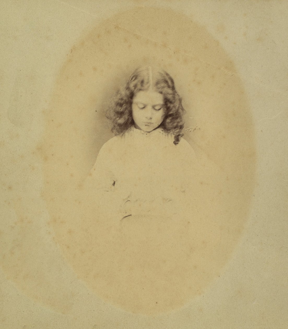 Edith Liddell Seated Beside a Vase of Foxgloves