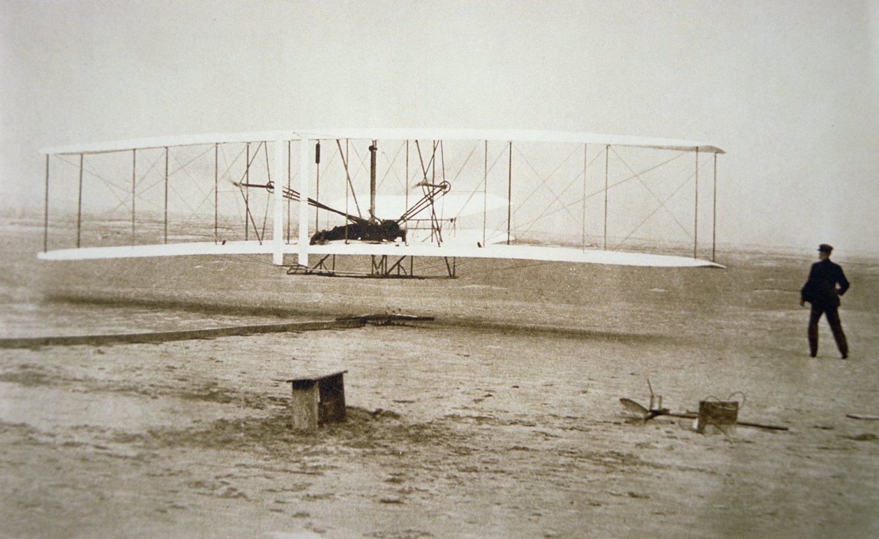 The Wright Brothers Making Their First Powered Flight