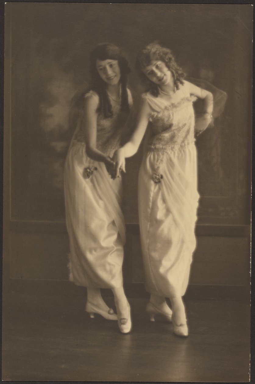 Portrait of Two Young Women in Matching Dresses