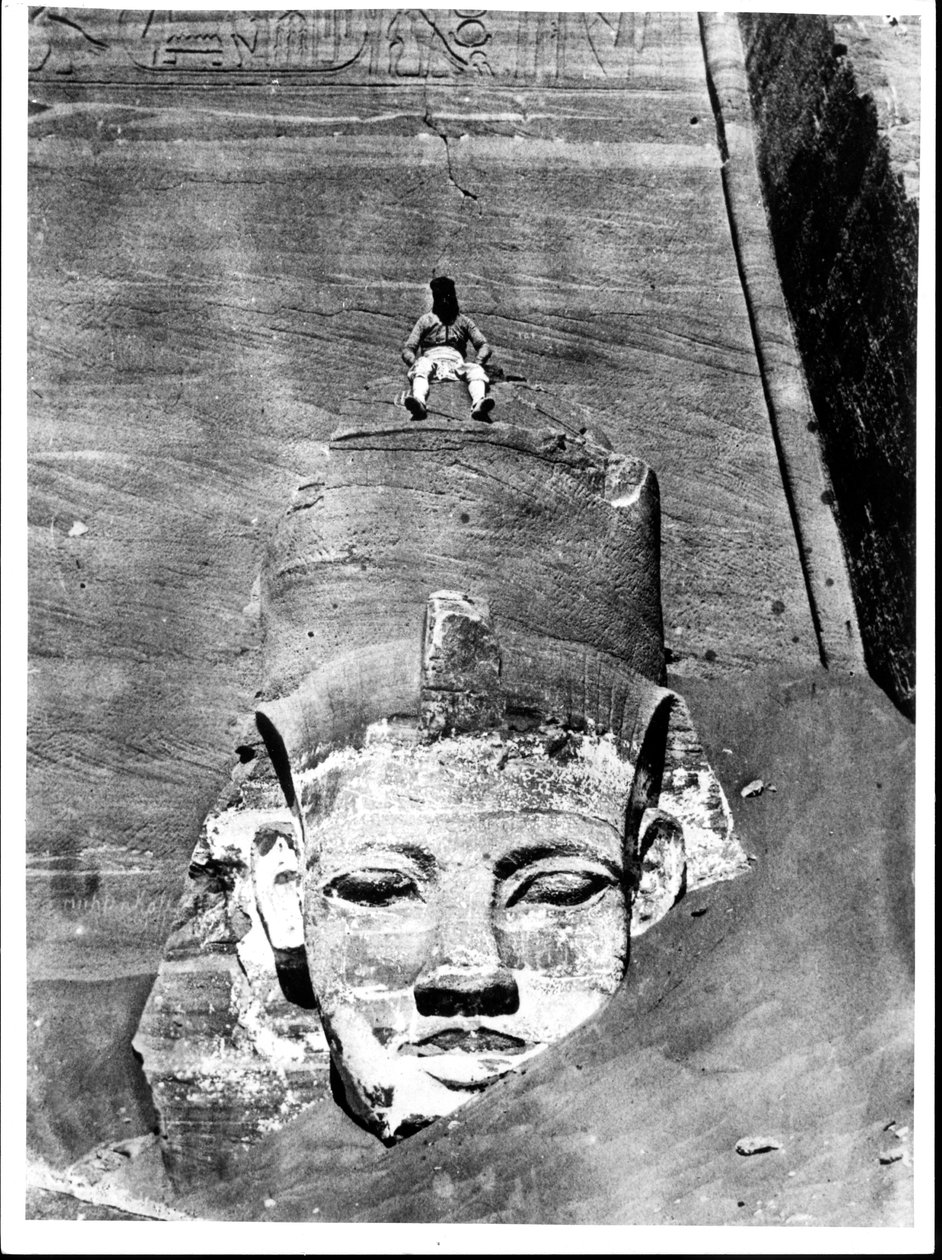 Egyptian Seated on a Colossal Figure of the King, from the Great Temple ...