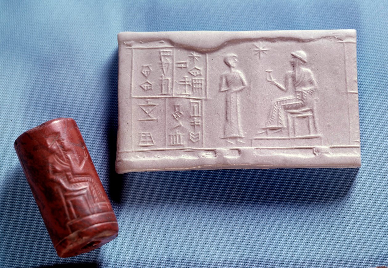 Mesopotamia: Quarz stone seal and molding representing a figure ...