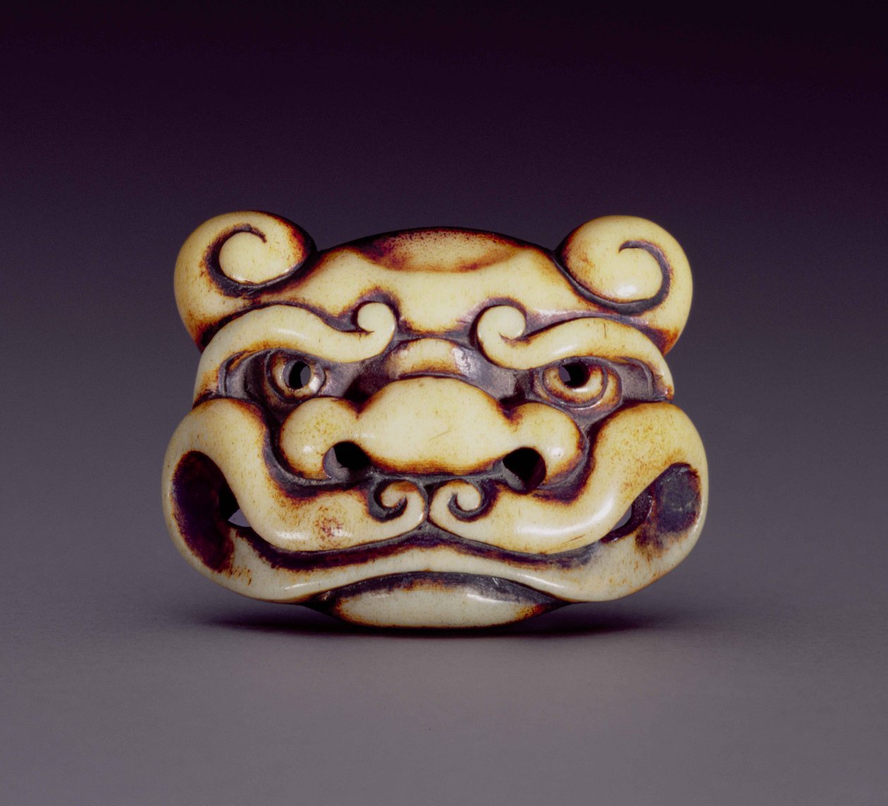 Netsuke Depicting the Face of an Oni Demon by Ozaki Kokusai