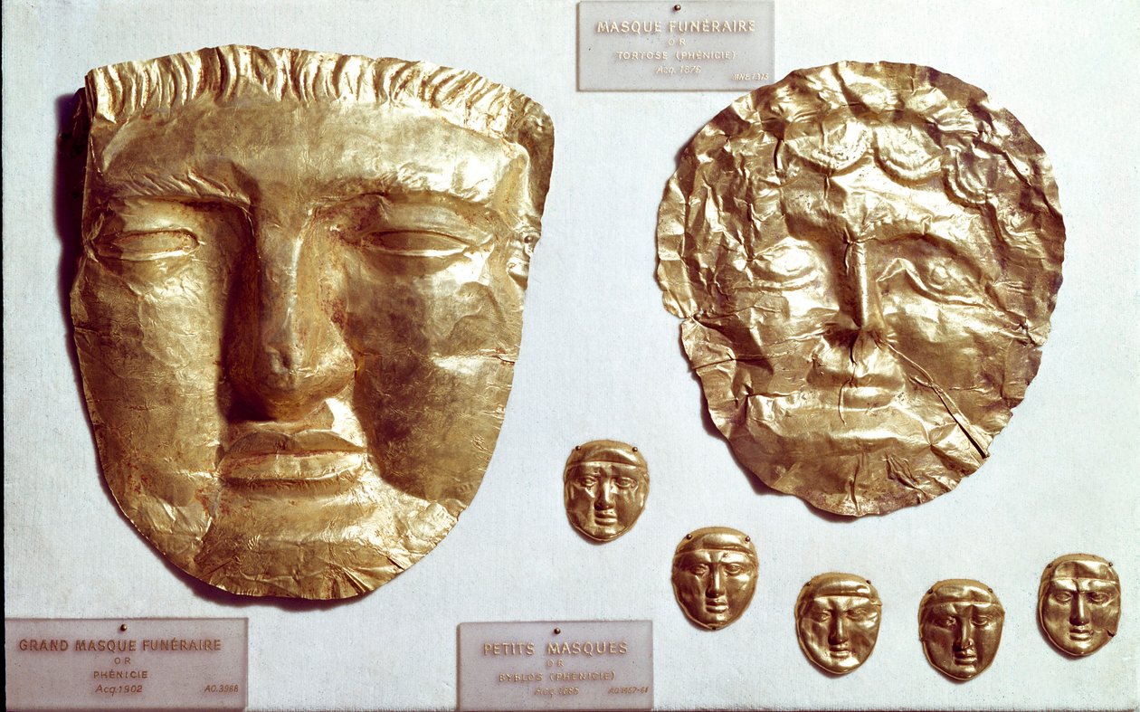 Large Gold Leaf Masks on the Face of Woman and Man