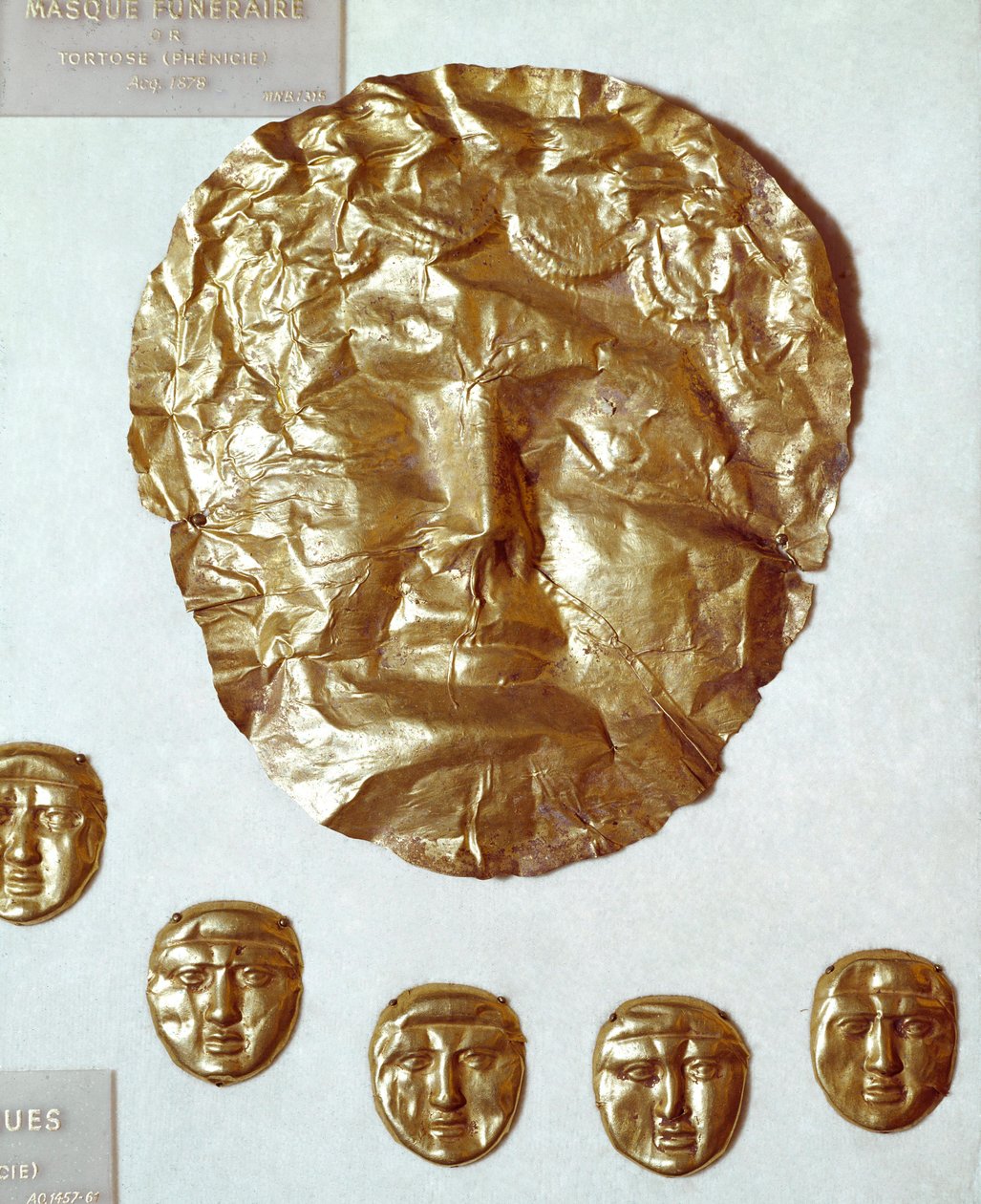 Phoenician Art: Large Mask of Gold Leaf on Woman's Face and Group of ...