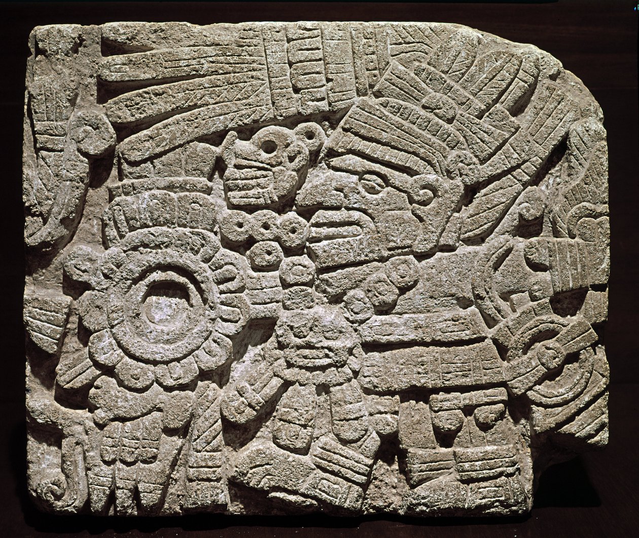Sculpted Pectoral Representing a Richly Dressed Character
