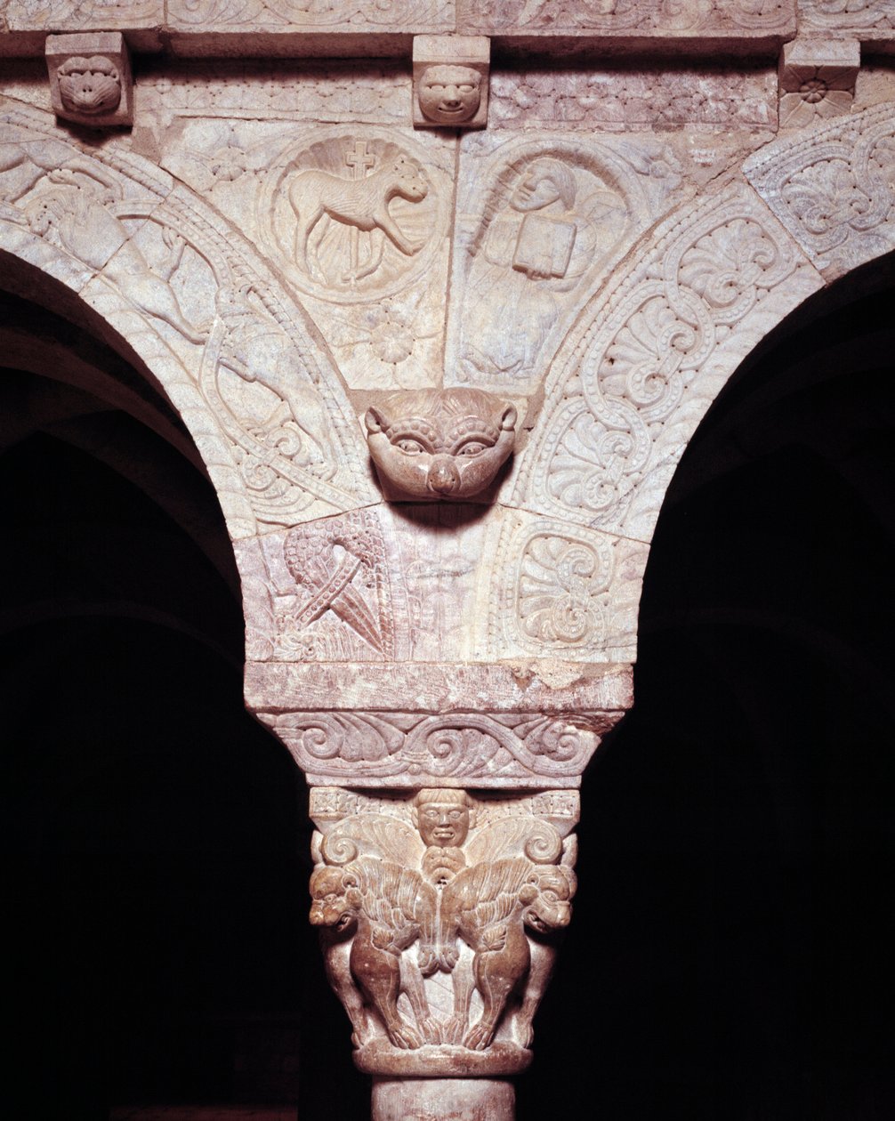 Detail of the lamb of God and symbol of evangelist Luke, carved on the ...