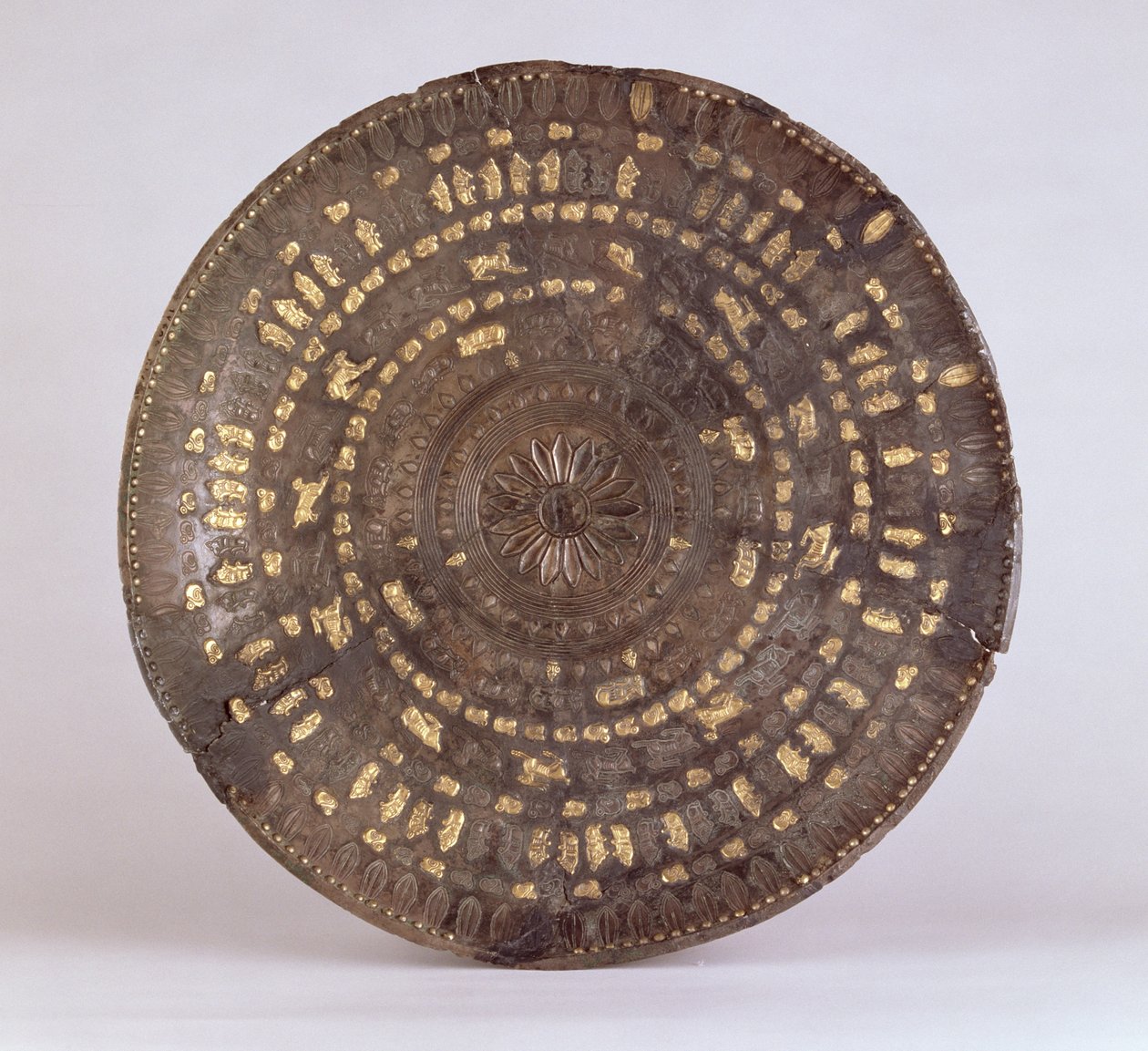 Dish with ten circles of Scythian motifs, from Ziwiyeh, Iran, c.7th ...