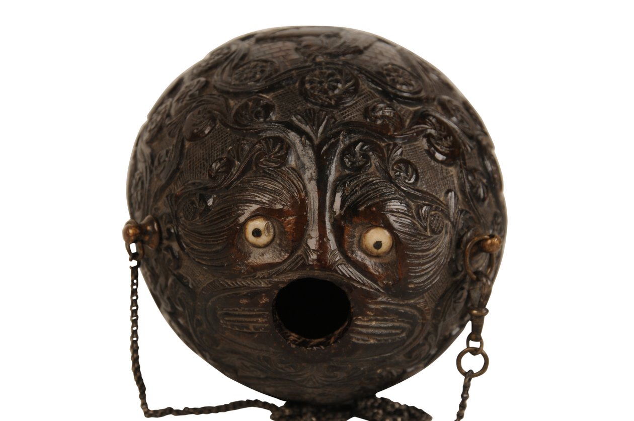 Carved coconut powder flask bugbear, Spanish Colonial, early 19th century
