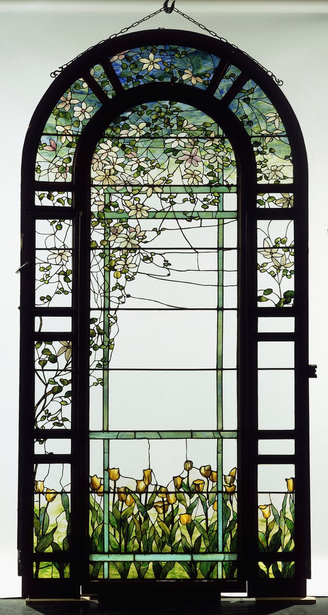 A leaded glass trellised window depicting clematis vines, early 20th ...