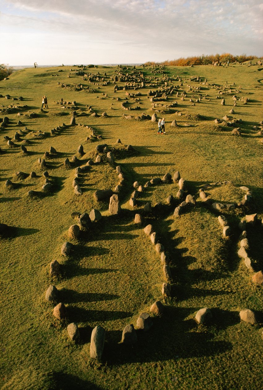 Hull-shaped stone markers set by Vikings dot an ancient burial ground ...