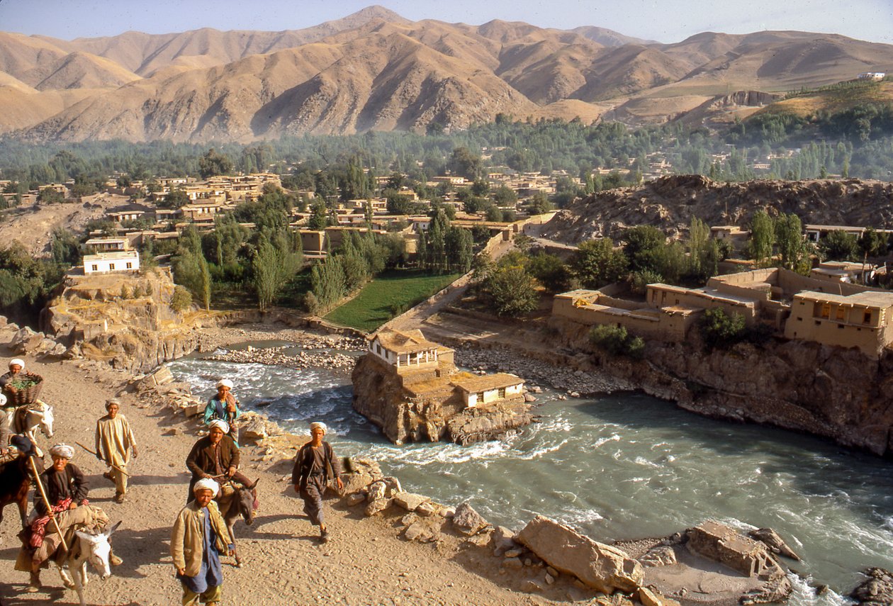Tribesmen by Kokcha River passing through gorge in Faizabad, an Afghan ...