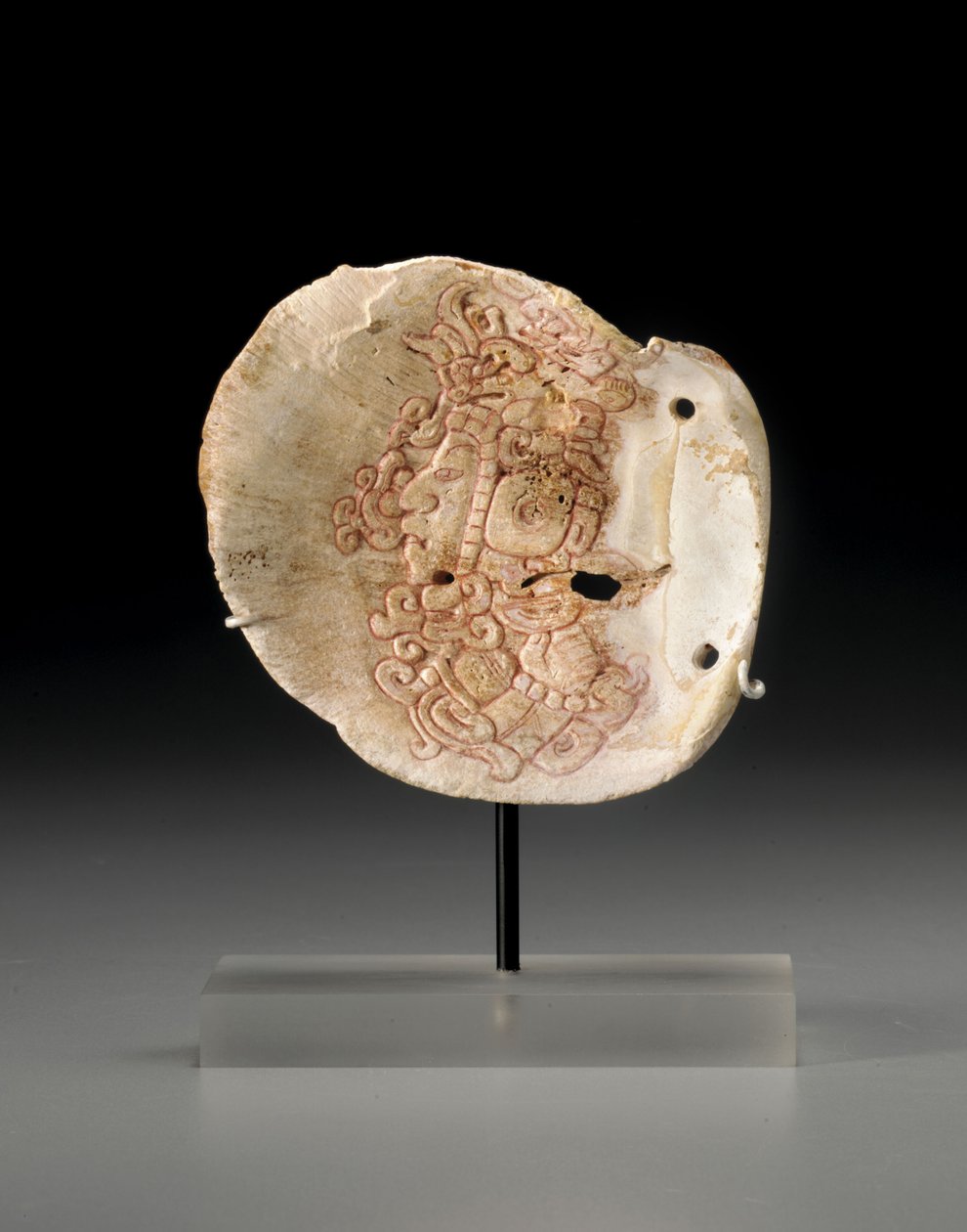 Mayan Shell Pectoral with the Profile Torso of a Dignitary