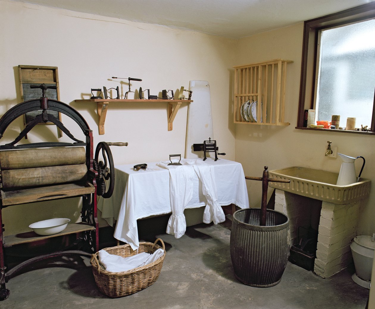 Late Victorian kitchen interior with a working range