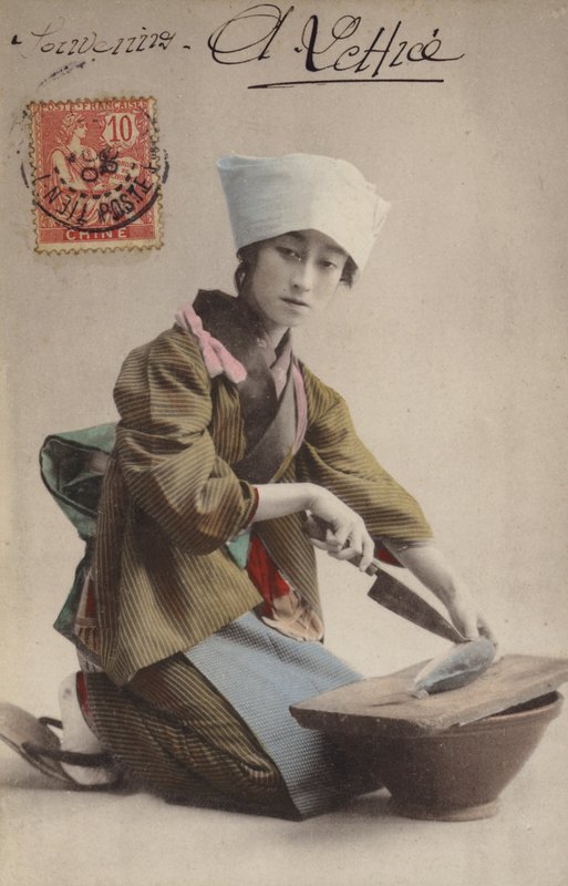 Japanese Girl Filleting Fish by French Photographer