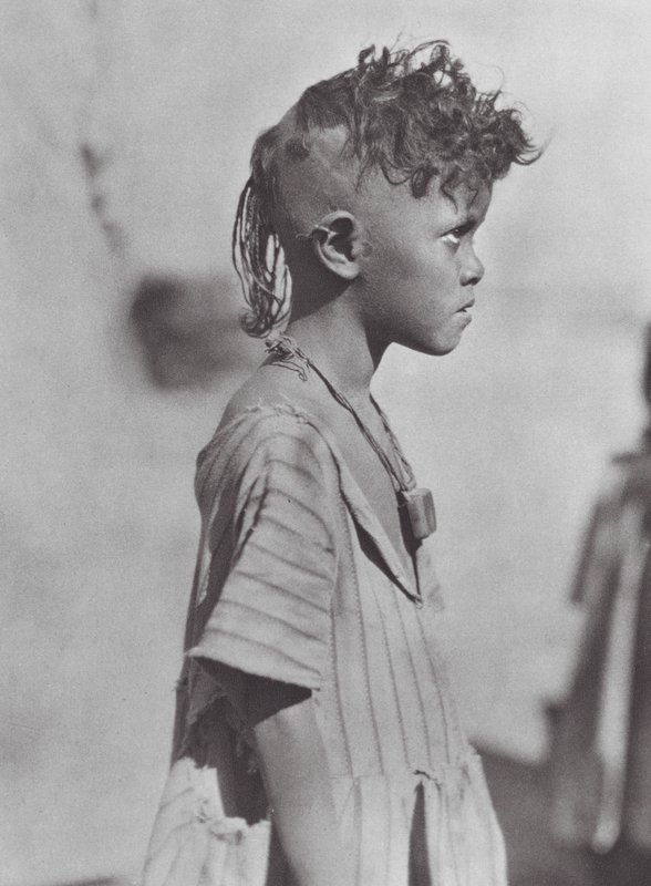 Africa: Bisharin child with amulet by Hugo Adolf Bernatzik